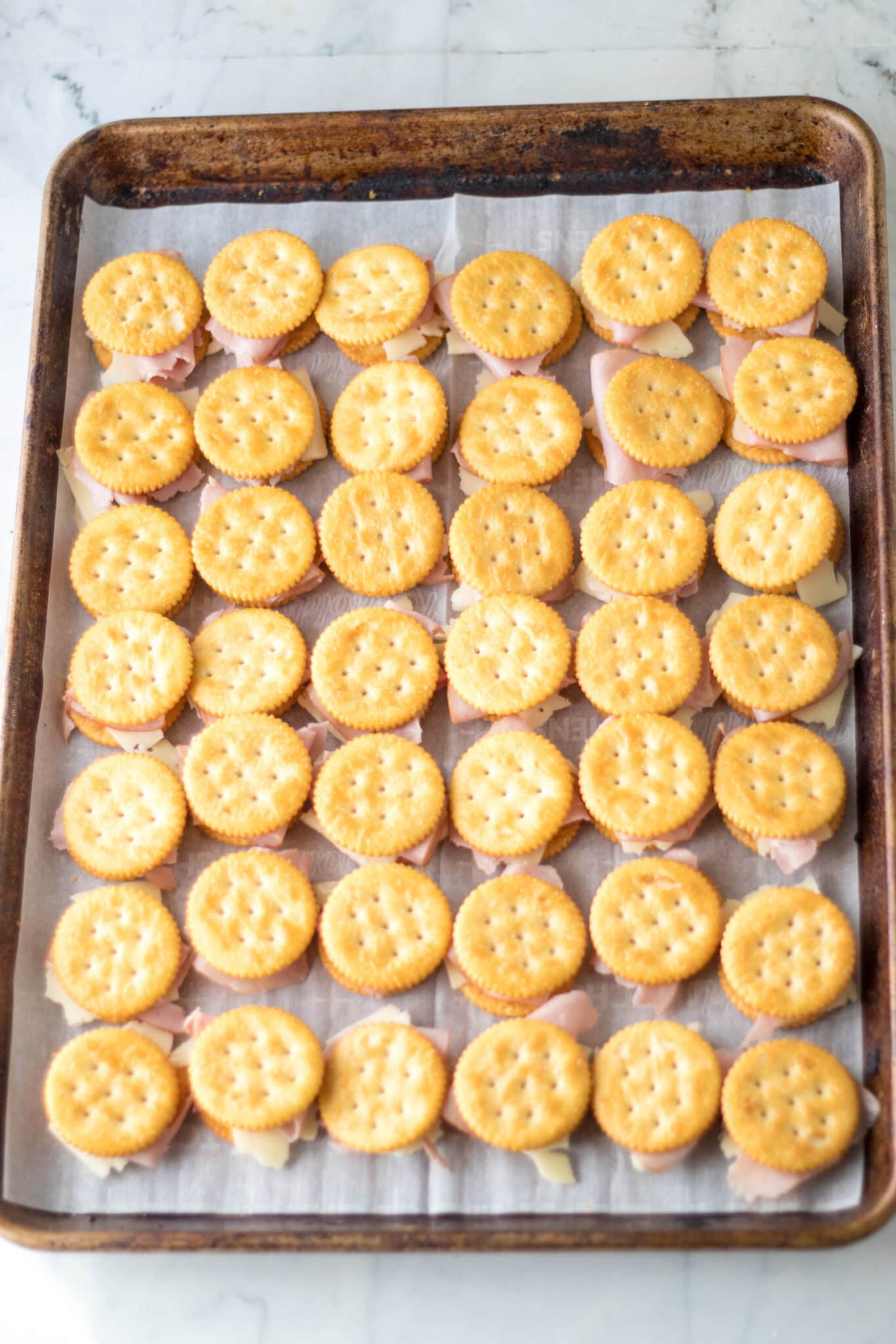 Buttery Ritz Ham Sandwiches with a Flavorful Twist - Bite-Sized Bash