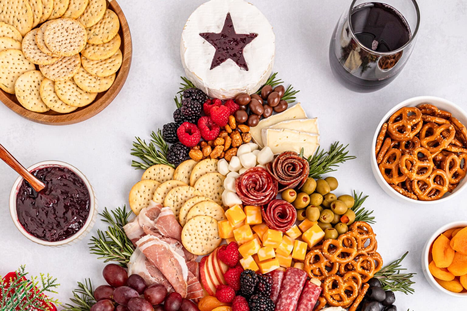 Christmas Tree Charcuterie Board on a Grazing Table - Bite-Sized Bash
