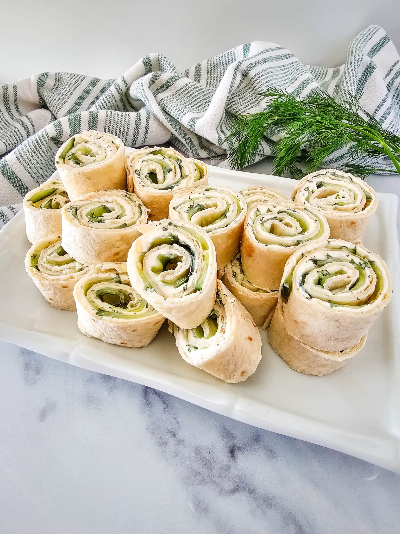 Light and Refreshing Cucumber Dill Pinwheels - Bite-Sized Bash