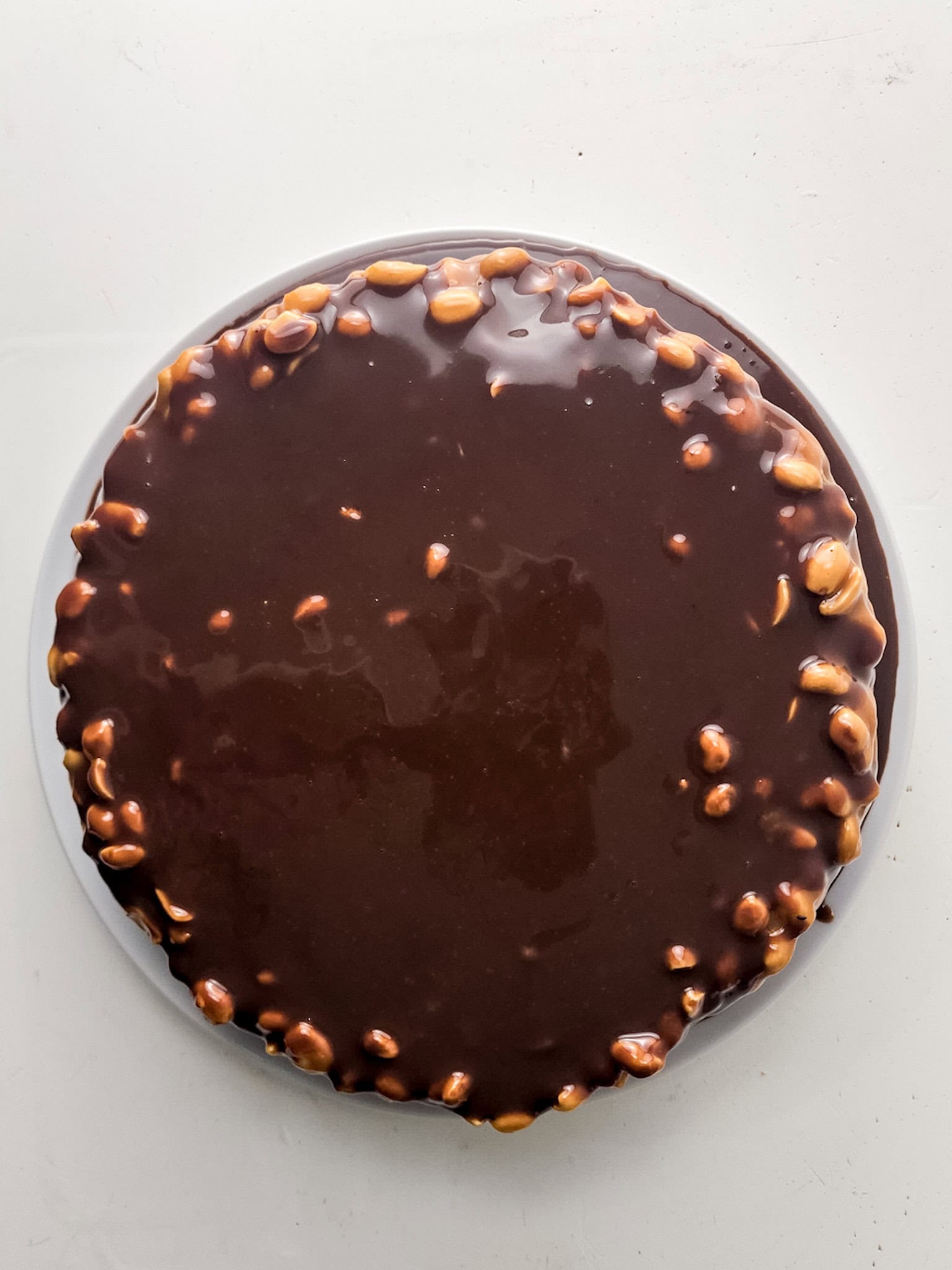 Oreo, Caramel, and Chocolate Heaven: Snickers Cheesecake Recipe - Bite ...