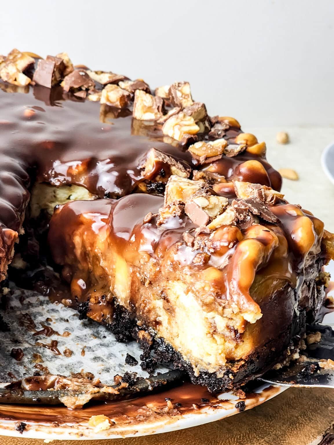 Oreo, Caramel, and Chocolate Heaven: Snickers Cheesecake Recipe - Bite-Sized Bash