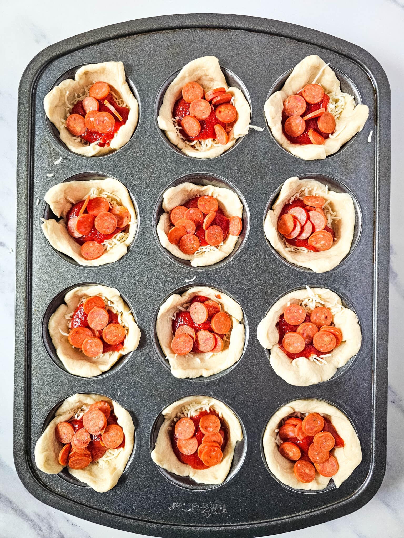 Easy-to-Make Pepperoni Pizza Puffs Recipe - Bite-Sized Bash