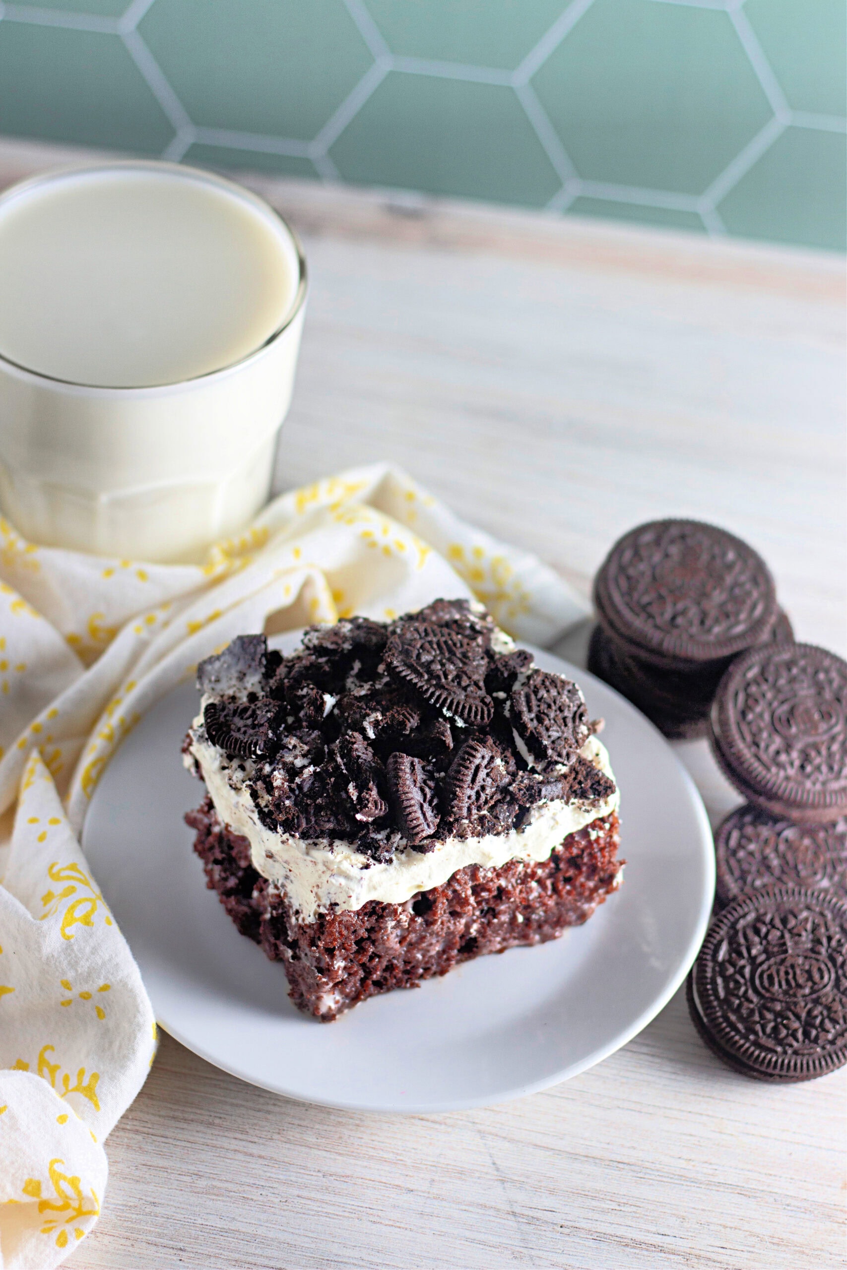 Creamy, Dreamy Milk and Oreo Poke Cake - Bite-Sized Bash